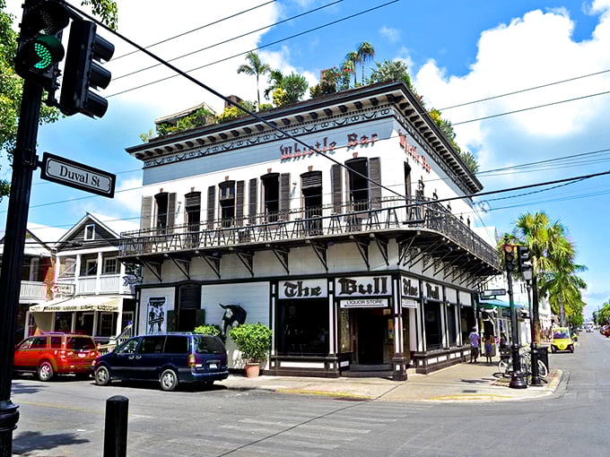 The Bull & Whistle Bar exemplifies Key West's historic architecture and lively atmosphere, where Conch Republic culture thrives in buildings dating back generations.