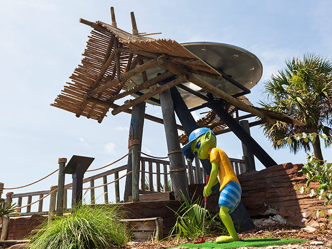 Alien on course: This extraterrestrial seems to have found the perfect observation post. From here, he can study the curious human ritual of mini-golf.