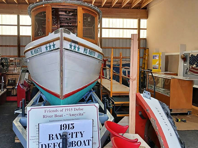 The 1915 "Amycita" river boat adds nautical rescue history to the collection, its wooden craftsmanship a beautiful contrast to the metal fire apparatus.