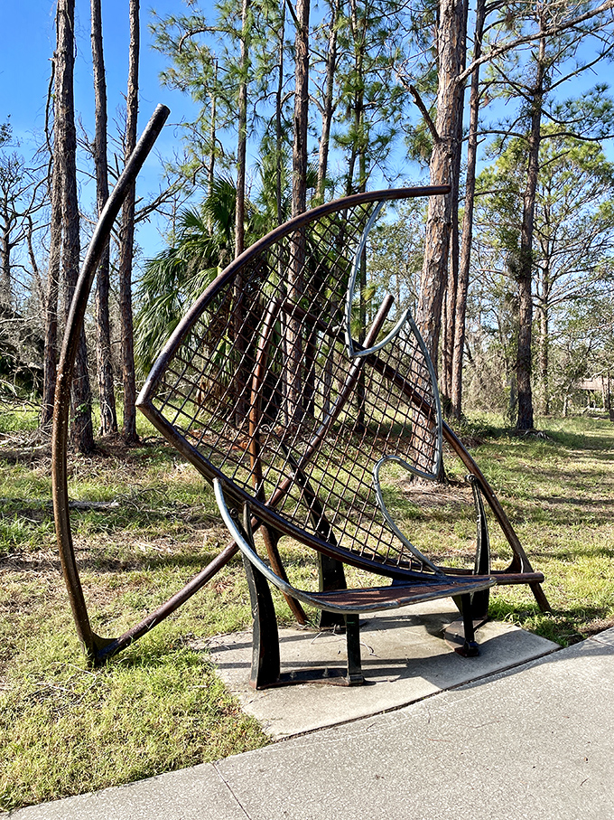 This artistic bench isn't just functional&mdash;it's a fish-shaped conversation starter for park visitors needing a rest.