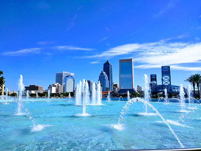 Perfect Florida skies create an ideal backdrop for Friendship Fountain's soaring jets, a refreshing sight that draws locals and tourists alike.