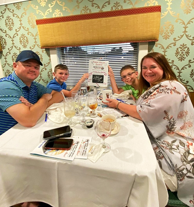 Families and friends gather to enjoy both the meal and the mystery, proving that nothing brings people together quite like a good murder.