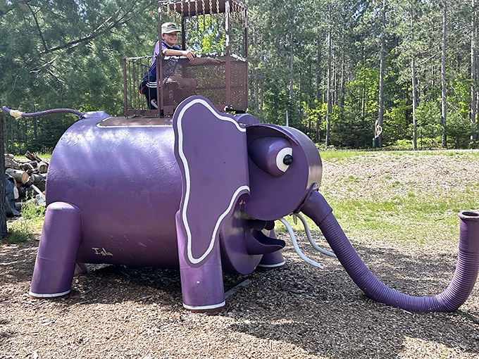 Children delight in climbing aboard this purple pachyderm, complete with a riding platform that transforms sculpture into interactive playground equipment.