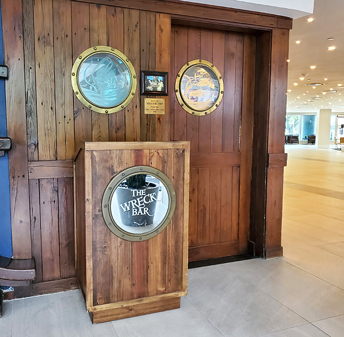 Entrance: Porthole-adorned wooden doors mark the threshold between ordinary life and underwater fantasy &ndash; the perfect portal to your evening's adventure.