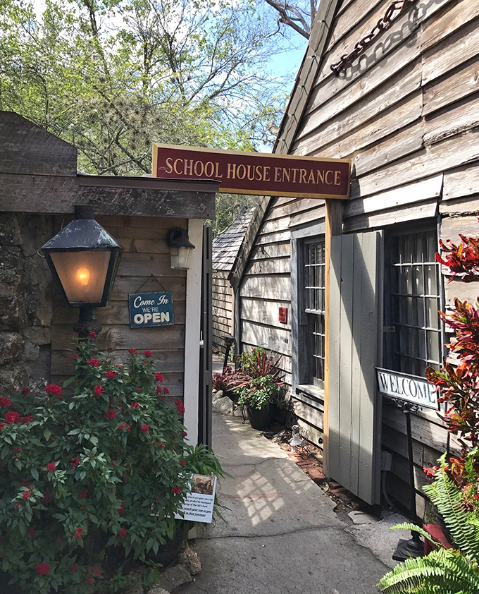 "School's in session!" &ndash; A glowing lantern and welcoming sign invite curious minds to step through this portal to educational practices past.