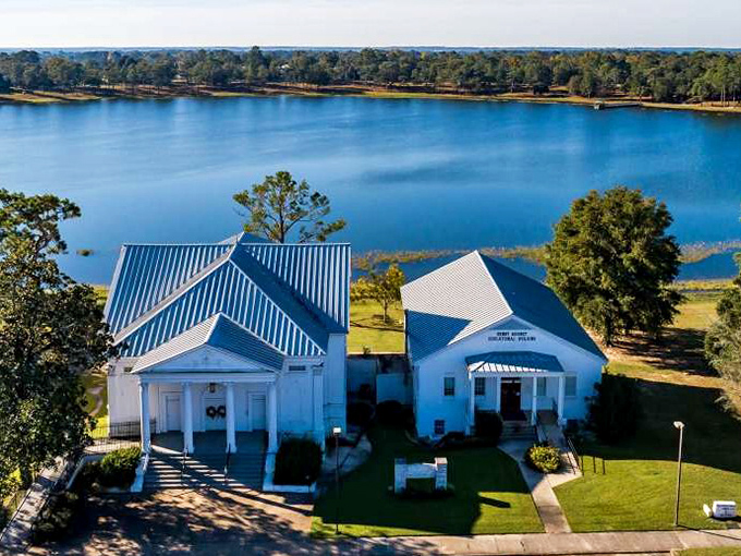 The First Baptist Church creates a postcard-perfect reflection on the lake's surface – architectural grace mirrored in nature's own perfect circle.