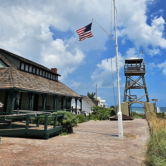 Gilbert's Bar House of Refuge whispers tales of shipwrecks and survival, its weathered watchtower standing guard over Atlantic shores since 1876.