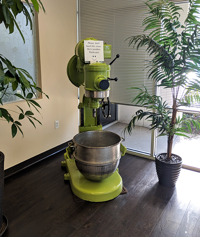 Large Mixer Display: The jolly green giant of kitchen equipment. This workhorse has whipped more cream and butter than most people see in a lifetime.
