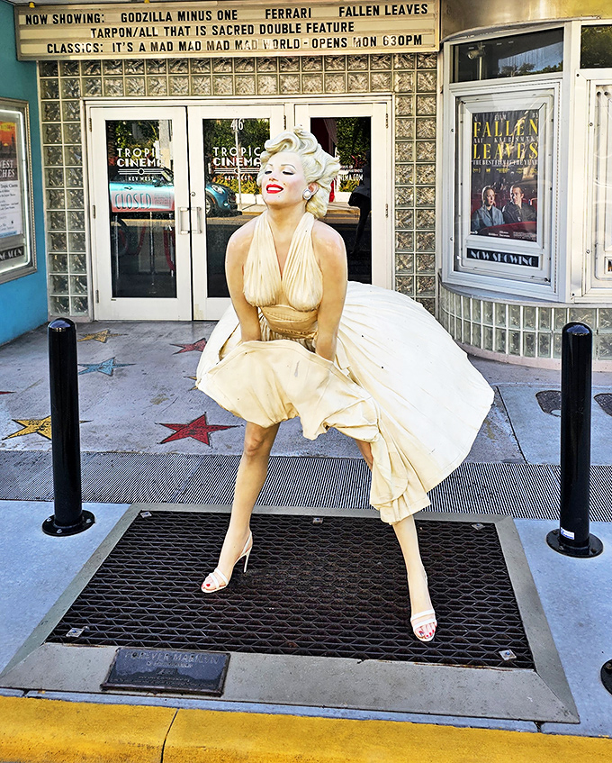 Marilyn's iconic pose greets visitors outside the Tropic, a playful reminder of Hollywood's golden age that awaits inside.