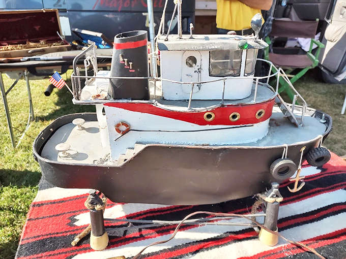 This detailed model tugboat showcases the kind of craftsmanship that makes collectors' hearts race, with every tiny detail perfectly rendered in miniature form that demands closer inspection and genuine appreciation.