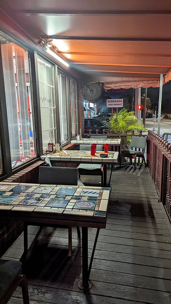 Mosaic tables and fresh air create the perfect setting for people-watching while contemplating a second round of pancakes.