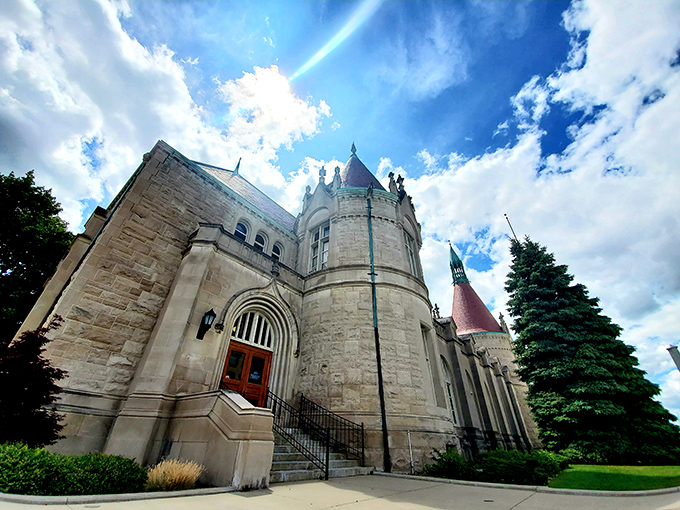 Those pink-tiled turrets against blue sky create the kind of postcard-perfect scene that makes you wonder why all buildings can't be this interesting.
