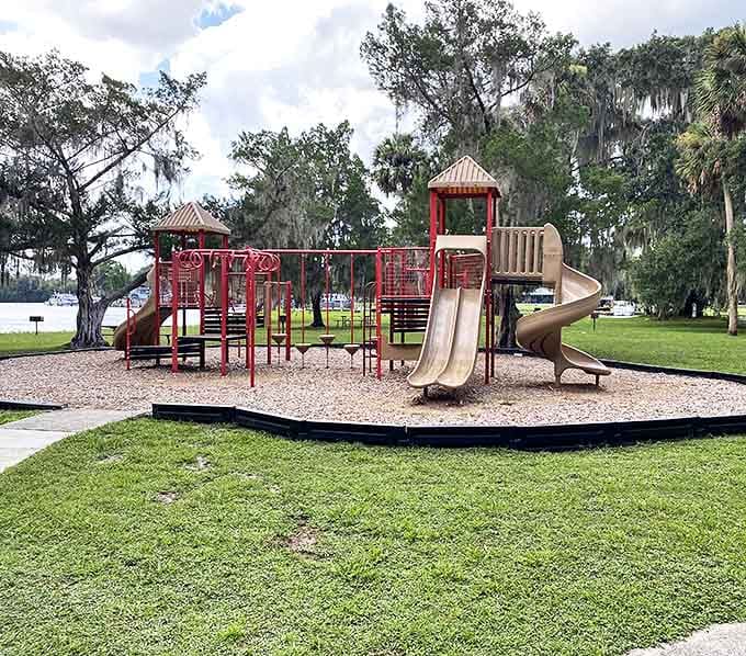 Childhood joy comes standard at this shaded playground, where imaginations run as wild as the surrounding forest.