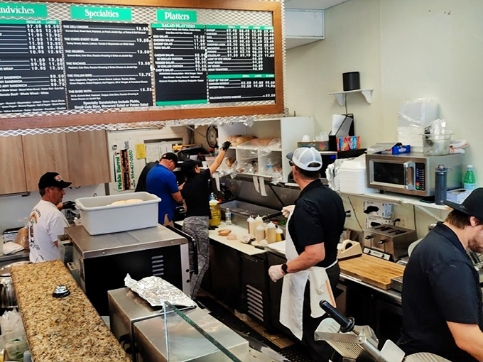 Preparation Area: The sandwich assembly line moves with the precision of a Swiss watch factory, but with more mustard.