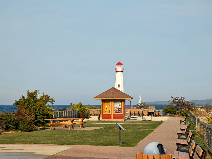 The perfect picnic spot where the lighthouse photobombs your lunch, making even a simple sandwich feel Instagram-worthy.