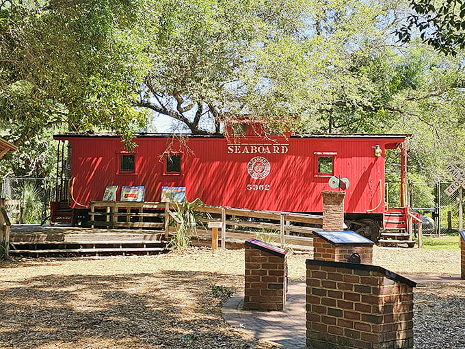 The bright red Seaboard caboose stands as a cheerful reminder of when railways were the superhighways connecting Florida's communities.