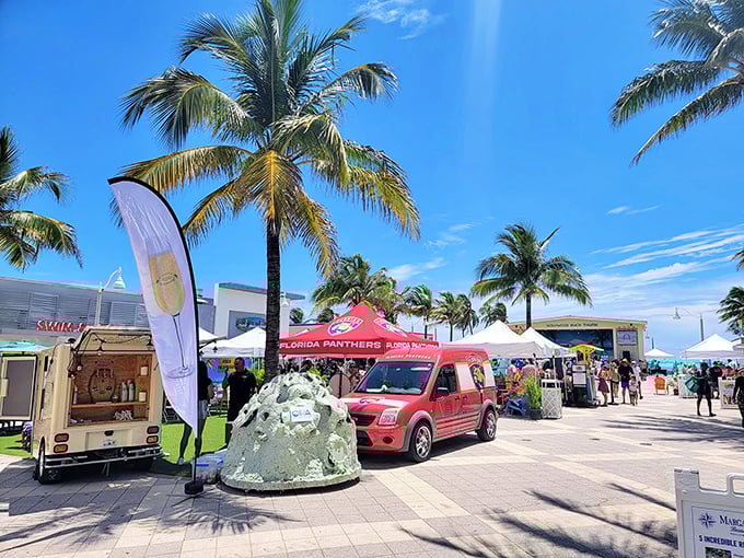 Palm-lined pathways showcase reef modules before deployment, giving visitors a preview of what lies beneath the waves.