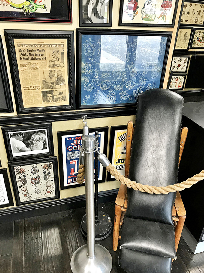 History on display &ndash; vintage newspapers and authentic tattoo chairs transport visitors to earlier eras of American tattooing.