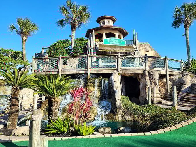 Waterfall Golf Cliff: Water cascades dramatically over sculpted rocks, creating both a visual spectacle and a challenging obstacle for even the most skilled putters.