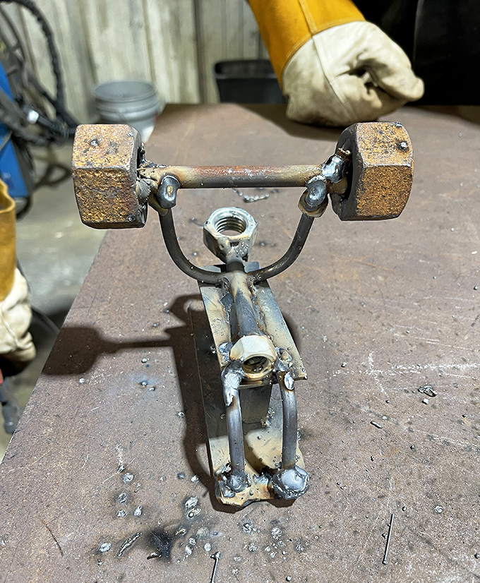 Even the smallest creations show incredible detail – this little weightlifter demonstrates that big artistic vision comes in all sizes.