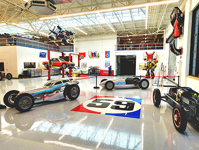 The workshop display shows that maintaining racing legends requires serious tools, expertise, and dedication to keeping history running rather than just sitting there gathering dust.