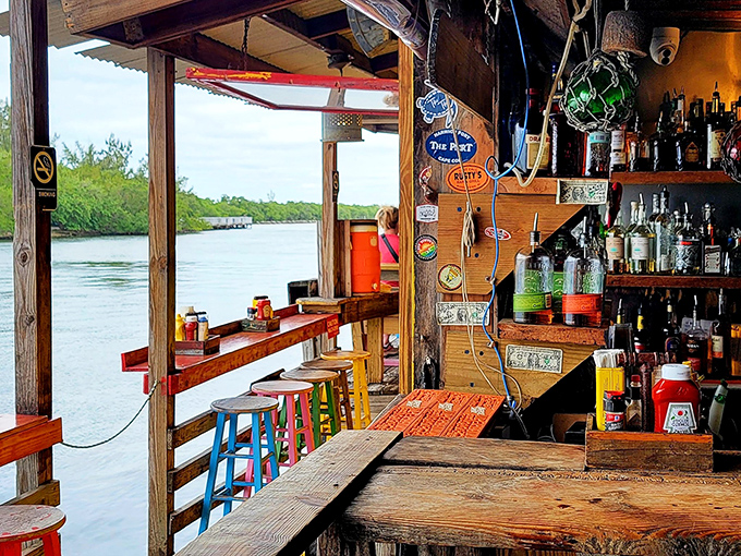 The bar area offers front-row seats to the Intracoastal Waterway – where cold drinks and water views create Florida perfection.