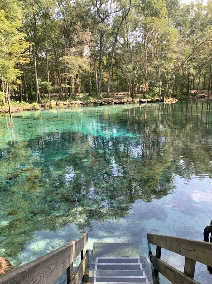 Nature's infinity pool: the crystal-clear spring creates a seamless blend with the sky, making it impossible to tell where water ends and heaven begins.