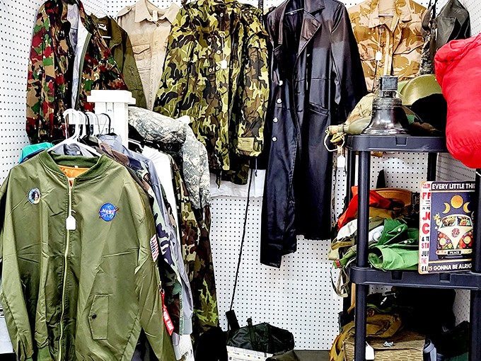 Military jackets stand at attention, each patch and insignia telling stories of service that deserve our respect and remembrance.