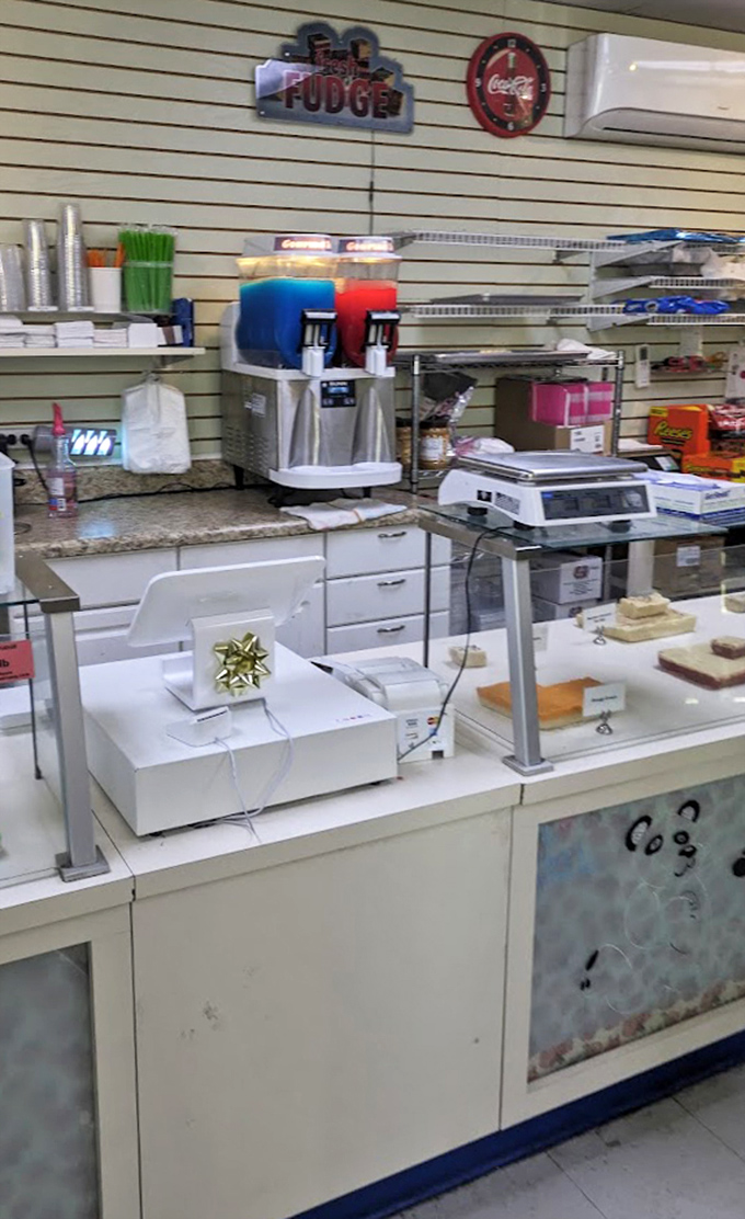 Behind the counter, sweet magic happens daily as confectionary dreams are carefully weighed, wrapped, and passed to eager hands.
