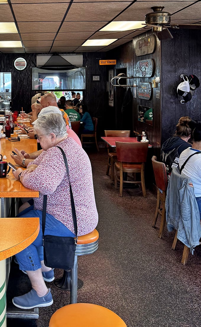 The dining room hums with conversation and clinking silverware—a community gathering place disguised as a restaurant.