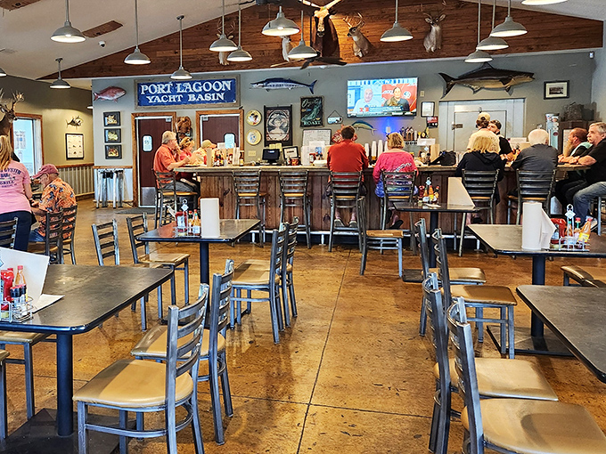 Tables arranged with just enough space for privacy but close enough to admire your neighbor's oyster platter with respectful envy.