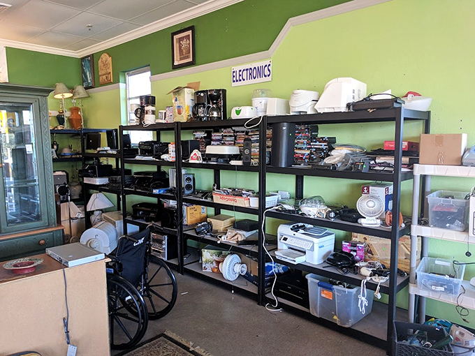 The electronics section &ndash; where vintage tech enthusiasts and practical bargain hunters converge in a tangle of cords and possibilities.