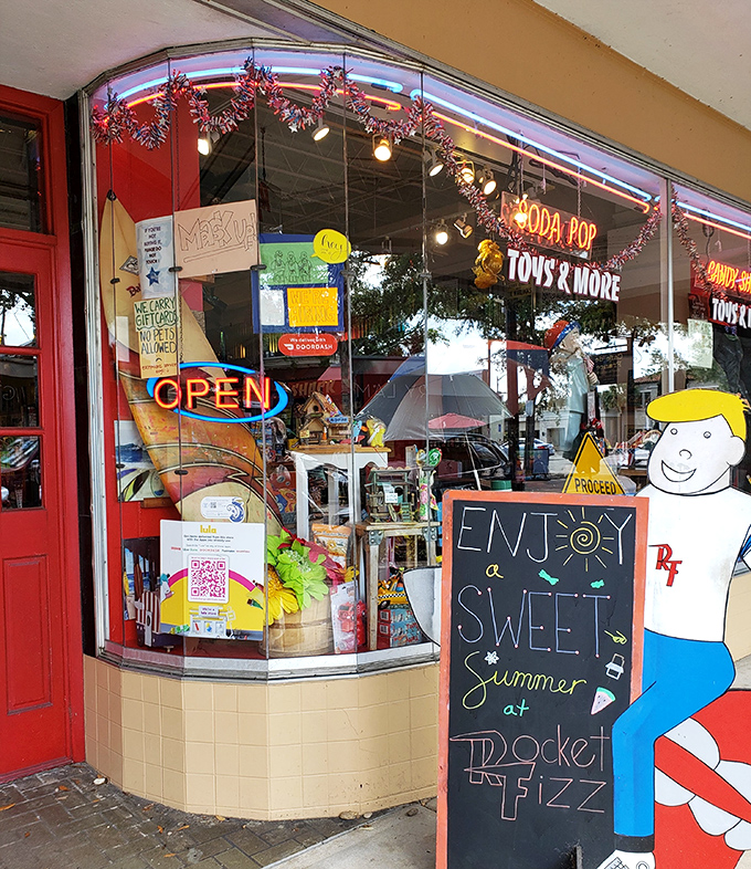 The welcoming entrance area sets the playful tone with its curved display window, vintage signage, and the promise to "Enjoy a Sweet Summer" inside.
