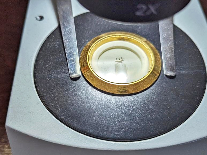 Artists work at this scale using brushes consisting of just a few hairs, creating details thinner than a human hair.