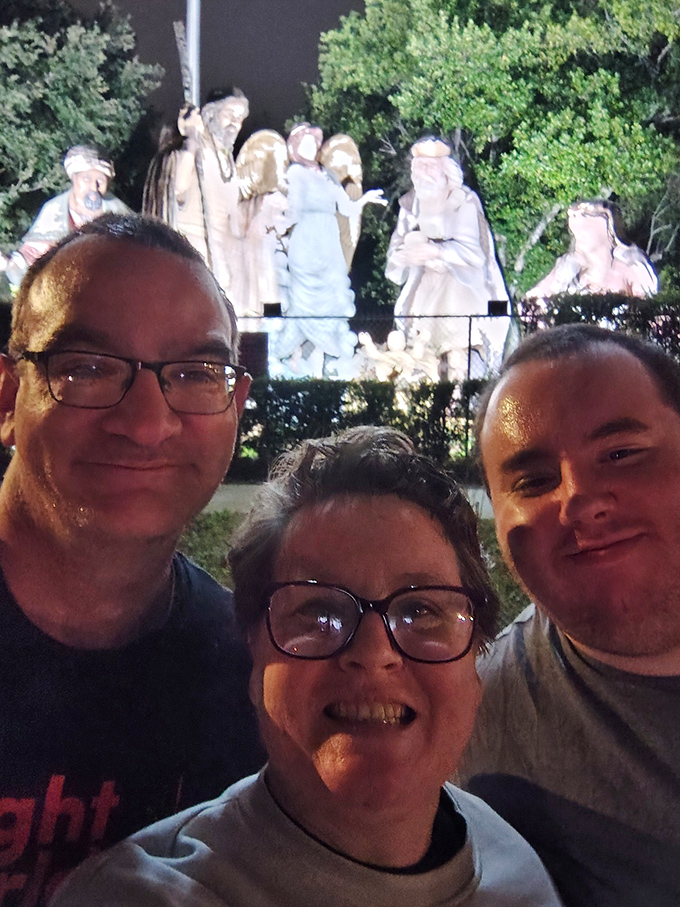 Visitors capture memories against this extraordinary backdrop, their smiles reflecting the unexpected joy of finding biblical giants in Florida.