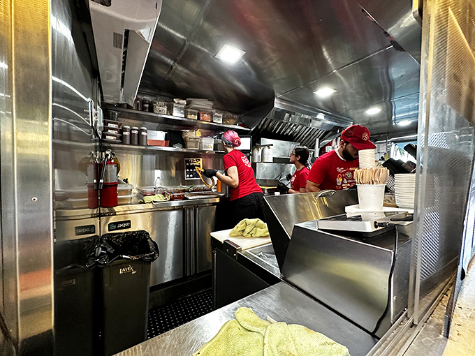 A glimpse into the production area reveals the careful craftsmanship behind each perfectly fried churro halo.
