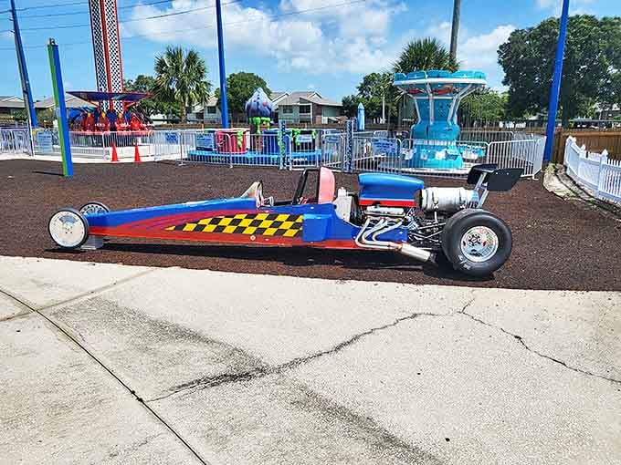 This front-engine dragster display pays homage to racing heritage, reminding visitors of the speed demons who inspired this thrill-seeker's paradise.