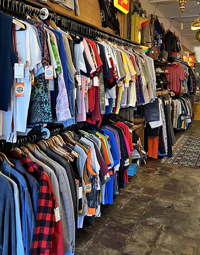 Men's vintage clothing organized by color creates a rainbow of possibilities &ndash; Hawaiian shirts and band tees from decades when style mattered.