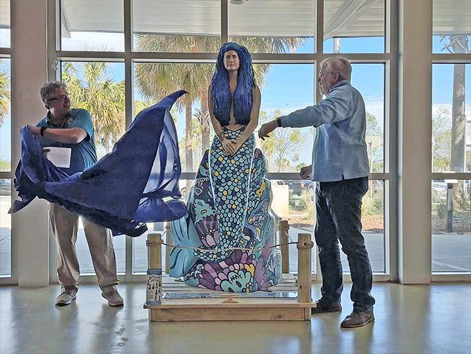 The big reveal moment captures pure artistic pride, like unveiling a masterpiece except your canvas has fins and an attitude.