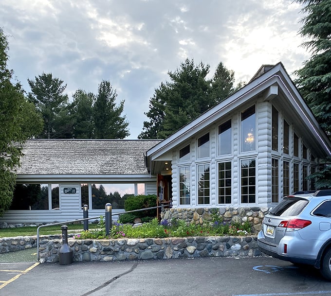 The exterior view showcases the restaurant's perfect blend of rustic charm and accessibility &ndash; a culinary cabin in the woods that's worth seeking out.