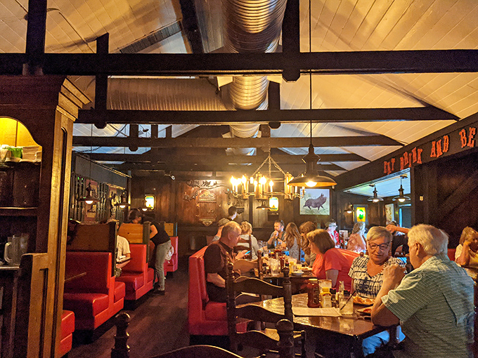 The dining room hums with conversation and clinking glasses, as exposed beams frame generations of good times.