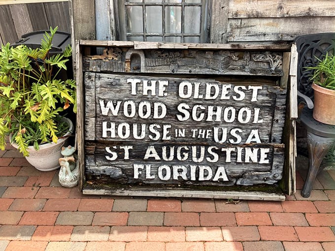 Weathered Welcome Sign: This charming introduction invites modern visitors to experience colonial education, complete with school bell ringing and classroom exploration.