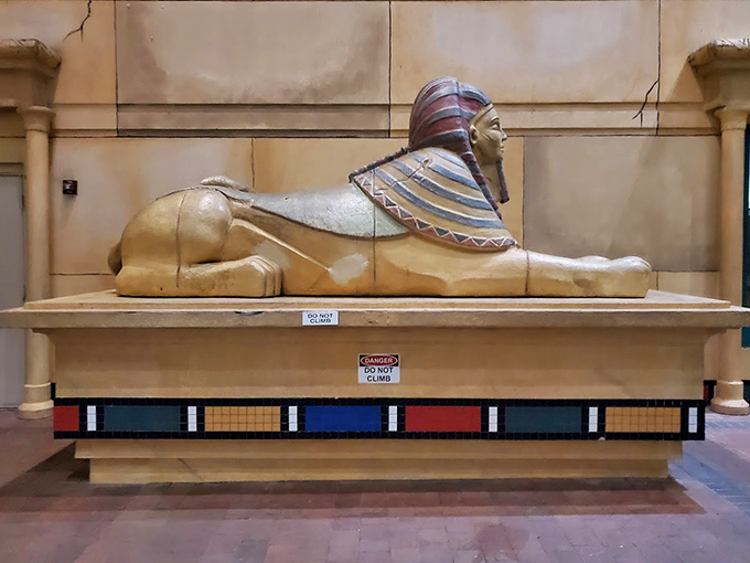 This sphinx-like statue watches over theatergoers, keeping the secret of which upcoming releases are actually worth seeing.