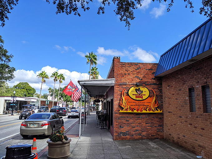 Brick sidewalks, palm trees, and storefronts bathed in Florida sunshine create the classic small-town streetscape that big cities try to replicate.