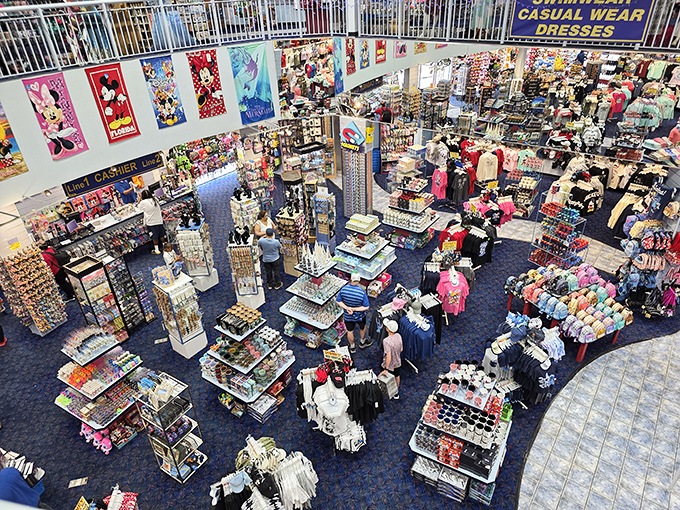 Bird's-eye view: From the upper level, the full glory of this merchandise kingdom unfolds below, a retail wonderland where Disney dreams and credit card limits collide.