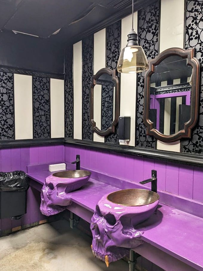 The bathroom's purple skull sinks transform washing your hands into an otherworldly ritual worthy of the Addams Family.