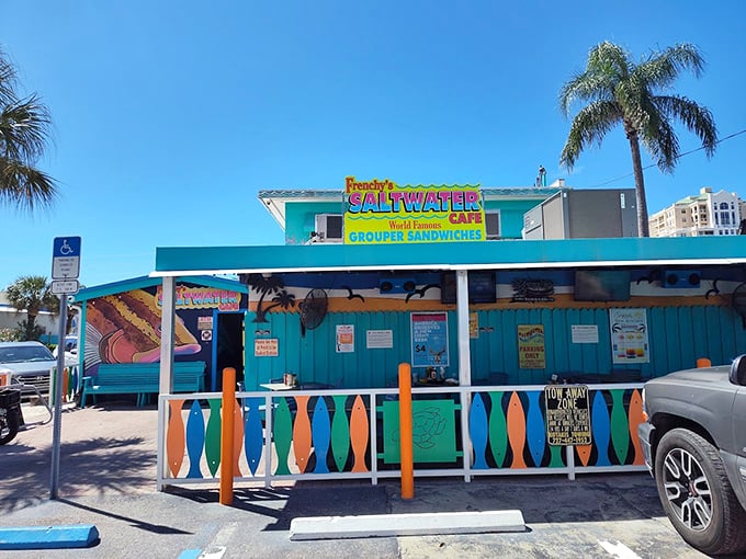 Frenchy's vibrant turquoise building stands out like a tropical paradise, promising grouper sandwiches that have achieved legendary status among seafood lovers.