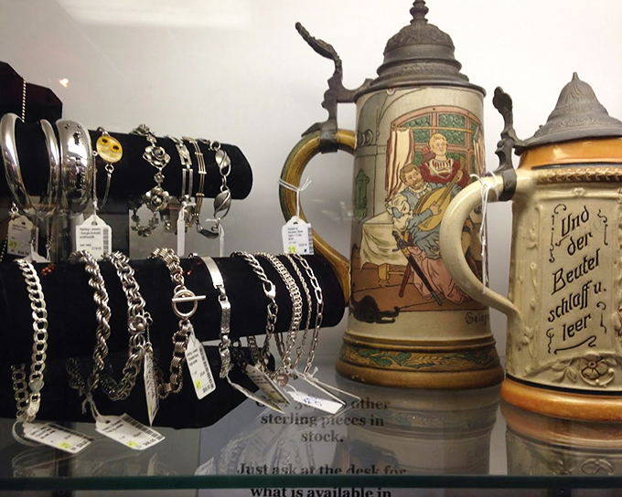 Sterling silver bracelets shine beside German beer steins that once toasted celebrations in faraway Bavarian beer halls.