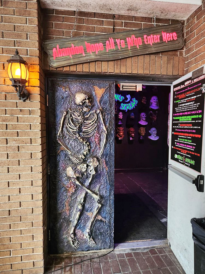 "Abandon hope all ye who enter here" warns the sign above a skeleton-embedded door &ndash; the most inviting uninviting entrance in all of Orlando.