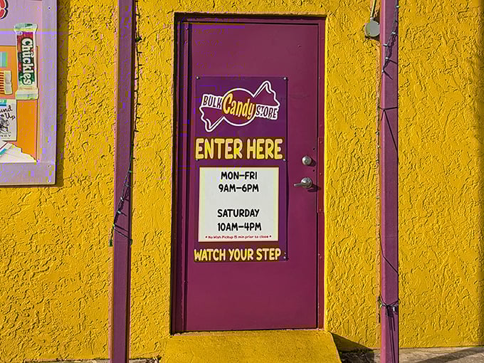 The purple door with yellow lettering serves as a portal to sweetness, with business hours that accommodate even the most urgent cravings.
